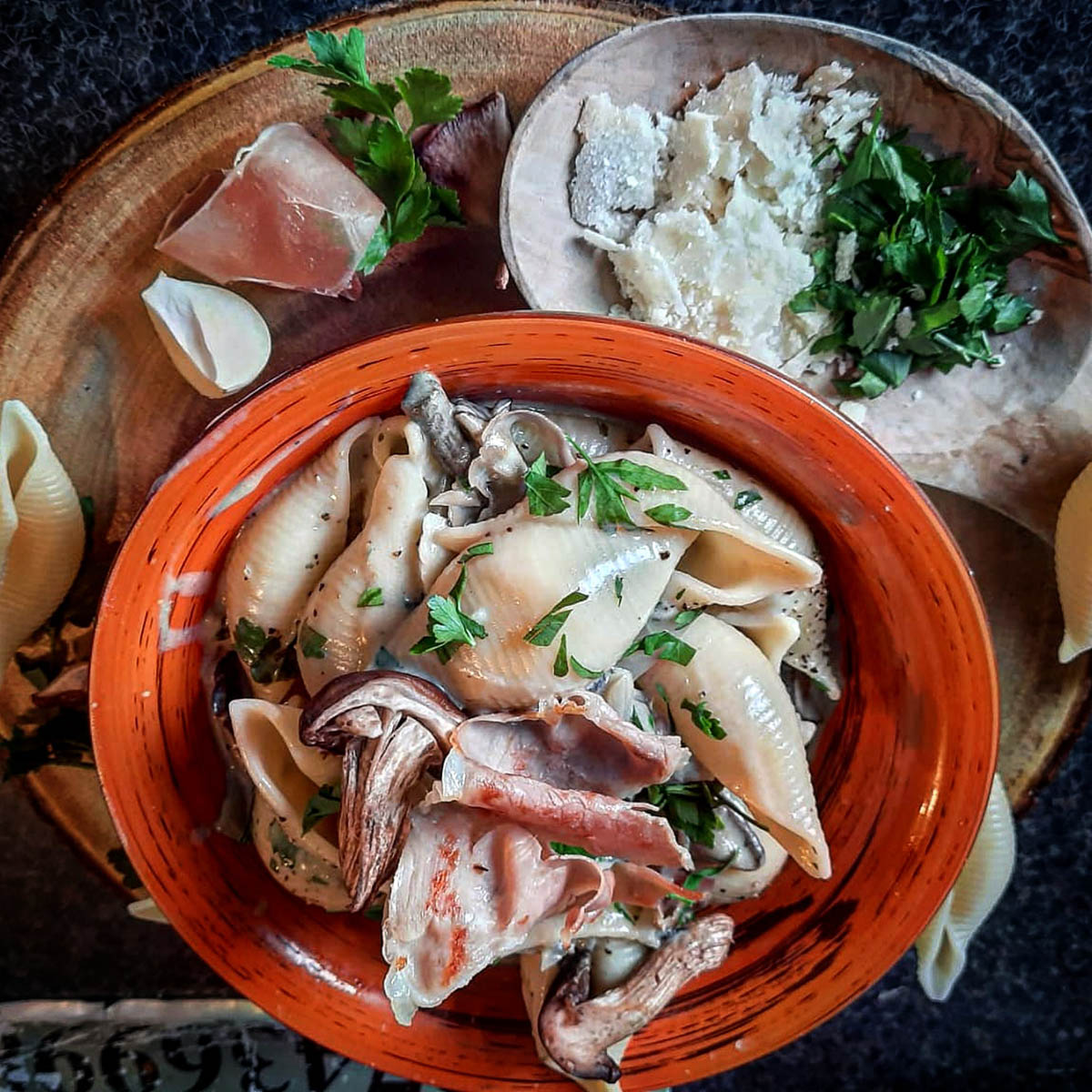 Conchiglie pasta with prosciutto ham, shitake mushrooms and a parmesan ...